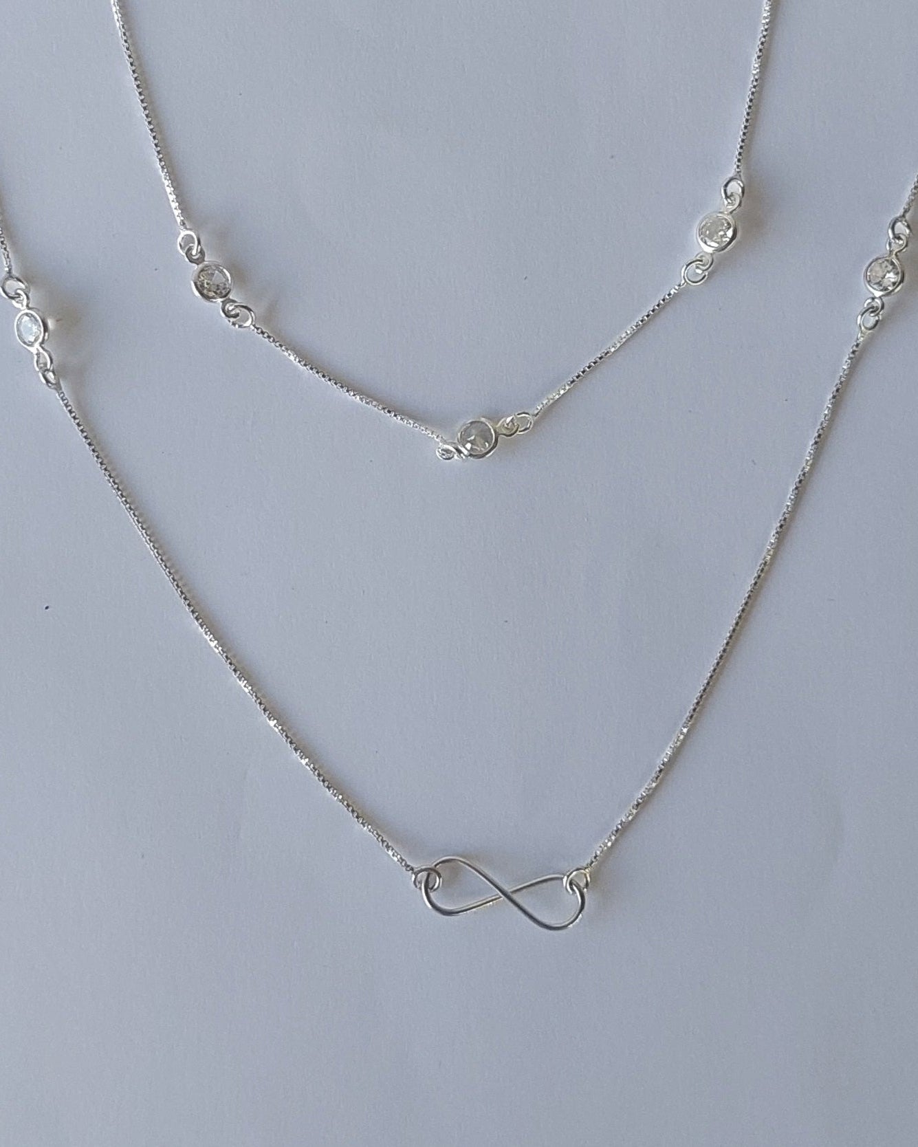 Cadena infinito con puntos de luz – Minina Joyas